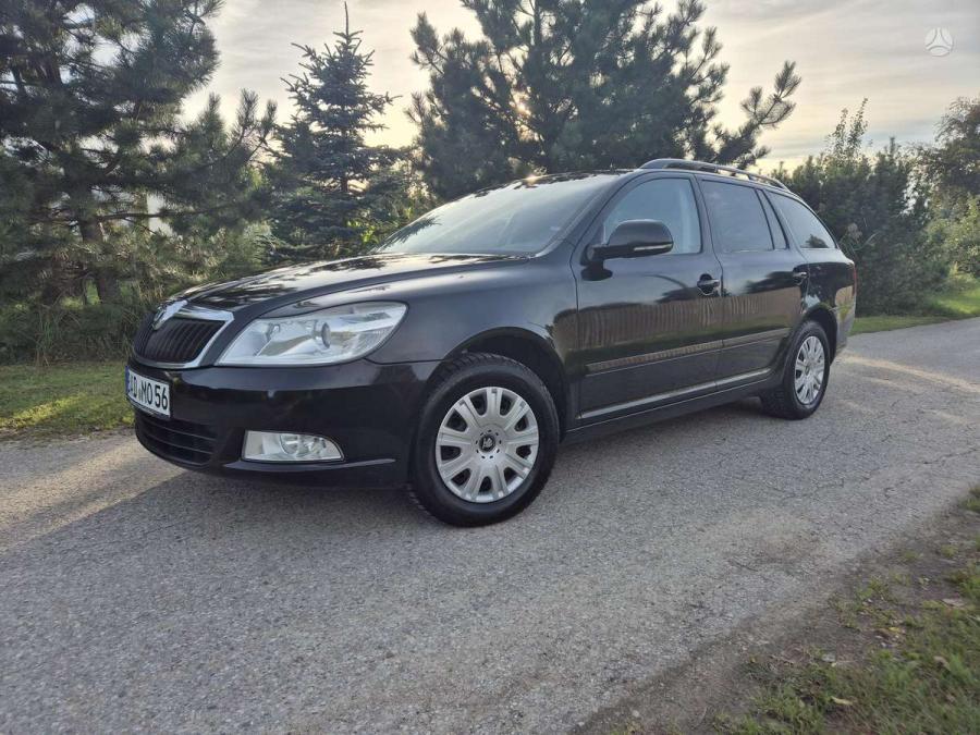 Черный Шкода Октавия 2011 в Каунас, объемом двигателя 1.97 л и пробегом 299 тыс. км за 3650 €, фото 10 на AUTOMOTO.COM.LV