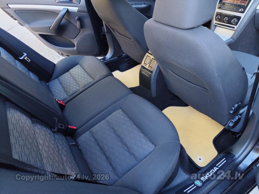 Melns Skoda Octavia 2011 Tartu, ar dzinēja tilpumu 1.60 L un nobraukumu 230 tūkst. km par 3300 €, foto 12 vietnē AUTOMOTO.COM.LV