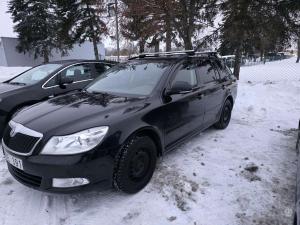 Black Skoda Octavia 2012 in Kaunas, with an engine capacity of 1.60 L and mileage of 240 thousand km for 5800 €, photo 6 on AUTOMOTO.COM.LV