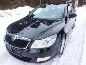Black Skoda Octavia 2012 in Utena, with an engine capacity of 1.97 L and mileage of 333 thousand km for 4500 €, photo 6 on AUTOMOTO.COM.LV