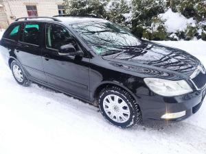 Black Skoda Octavia 2012 in Utena, with an engine capacity of 1.97 L and mileage of 333 thousand km for 4500 €, photo 8 on AUTOMOTO.COM.LV