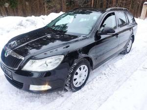 Black Skoda Octavia 2012 in Utena, with an engine capacity of 1.97 L and mileage of 333 thousand km for 4500 €, photo 9 on AUTOMOTO.COM.LV