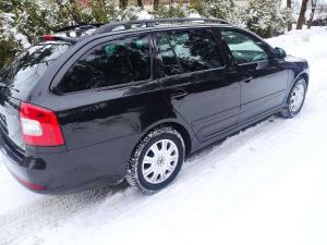 Black Skoda Octavia 2012 in Utena, with an engine capacity of 1.97 L and mileage of 333 thousand km for 4500 €, photo 10 on AUTOMOTO.COM.LV