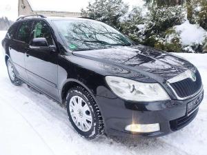 Black Skoda Octavia 2012 in Utena, with an engine capacity of 1.97 L and mileage of 333 thousand km for 4500 €, photo 11 on AUTOMOTO.COM.LV