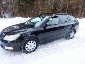Black Skoda Octavia 2012 in Utena, with an engine capacity of 1.97 L and mileage of 333 thousand km for 4500 €, photo 12 on AUTOMOTO.COM.LV