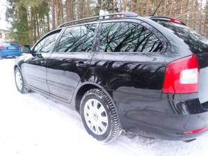Black Skoda Octavia 2012 in Utena, with an engine capacity of 1.97 L and mileage of 333 thousand km for 4500 €, photo 15 on AUTOMOTO.COM.LV
