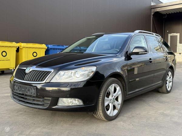 Black Skoda Octavia 2012 in Kaunas, with an engine capacity of 1.97 L and mileage of 231 thousand km for 4500 €, photo 1 on AUTOMOTO.COM.LV