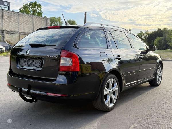 Black Skoda Octavia 2012 in Kaunas, with an engine capacity of 1.97 L and mileage of 231 thousand km for 4500 €, photo 9 on AUTOMOTO.COM.LV