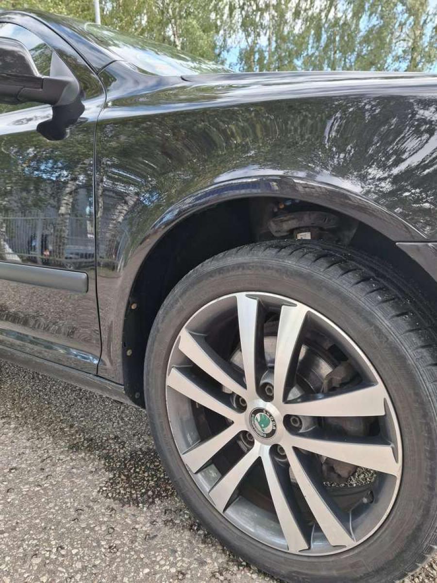 Black Skoda Octavia 2012 in Kaunas, with an engine capacity of 1.97 L and mileage of 201 thousand km for 5000 €, photo 12 on AUTOMOTO.COM.LV