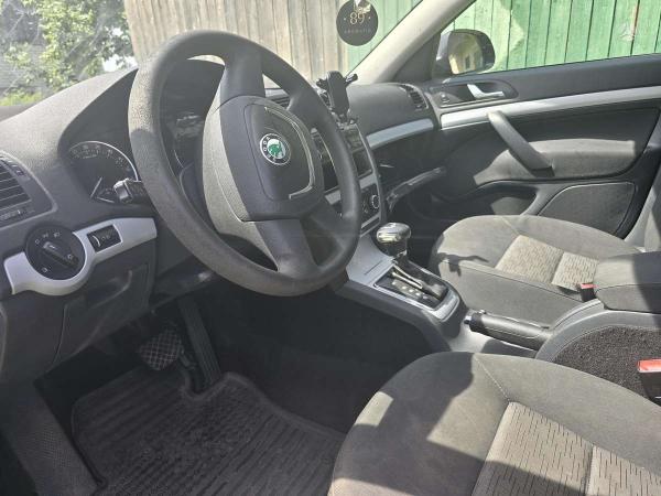 Melns Skoda Octavia 2012 Klaipėda, ar dzinēja tilpumu 1.60 L un nobraukumu 280 tūkst. km par 2500 €, foto 4 vietnē AUTOMOTO.COM.LV