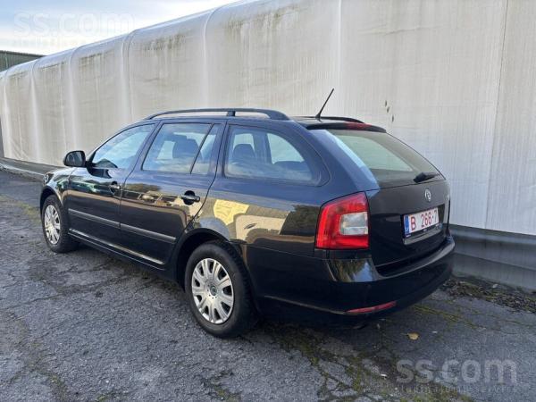 Melns Skoda Octavia 2012 Ogre, ar dzinēja tilpumu 1.20 L un nobraukumu 182 tūkst. km par 3990 €, foto 7 vietnē AUTOMOTO.COM.LV