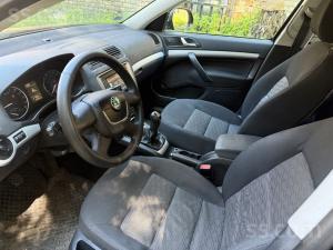 Melns Skoda Octavia 2012 Rīga, ar dzinēja tilpumu 1.60 L un nobraukumu 400 tūkst. km par 1100 €, foto 6 vietnē AUTOMOTO.COM.LV