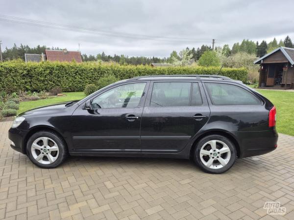 Black Skoda Octavia 2013 in Jonava, with an engine capacity of 2.00 L and mileage of 350 thousand km for 4000 €, photo 4 on AUTOMOTO.COM.LV