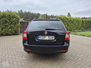 Black Skoda Octavia 2013 in Jonava, with an engine capacity of 2.00 L and mileage of 350 thousand km for 4000 €, photo 7 on AUTOMOTO.COM.LV