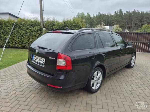 Black Skoda Octavia 2013 in Jonava, with an engine capacity of 2.00 L and mileage of 350 thousand km for 4000 €, photo 7 on AUTOMOTO.COM.LV
