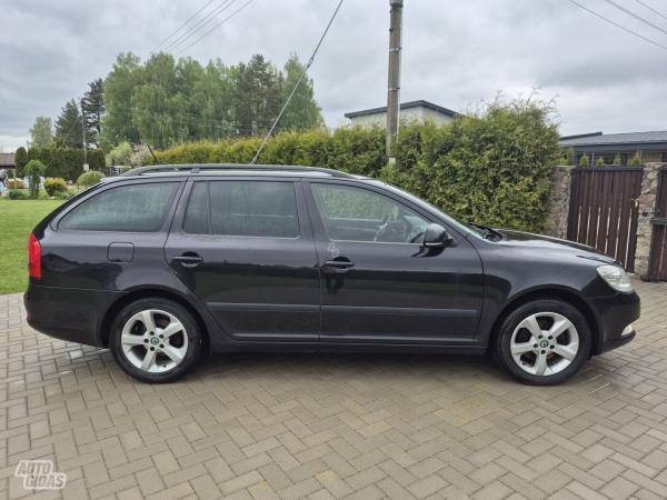 Black Skoda Octavia 2013 in Jonava, with an engine capacity of 2.00 L and mileage of 350 thousand km for 4000 €, photo 8 on AUTOMOTO.COM.LV