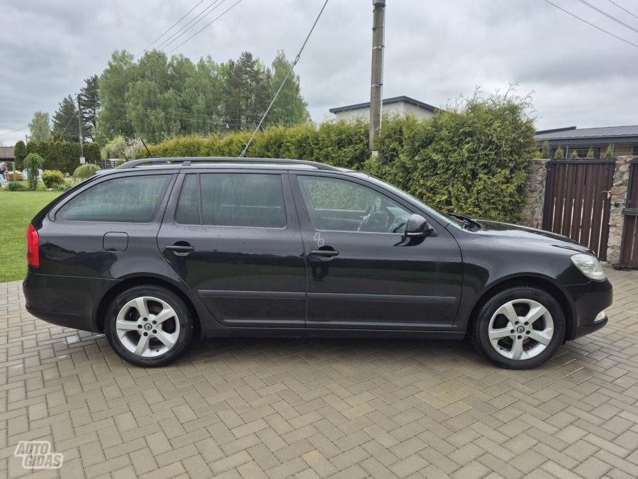 Black Skoda Octavia 2013 in Jonava, with an engine capacity of 2.00 L and mileage of 350 thousand km for 4000 €, photo 9 on AUTOMOTO.COM.LV