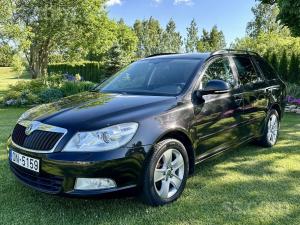 Black Skoda Octavia 2013 in Riga, with an engine capacity of 1.40 L and mileage of 260 thousand km for 3950 €, photo  on AUTOMOTO.COM.LV