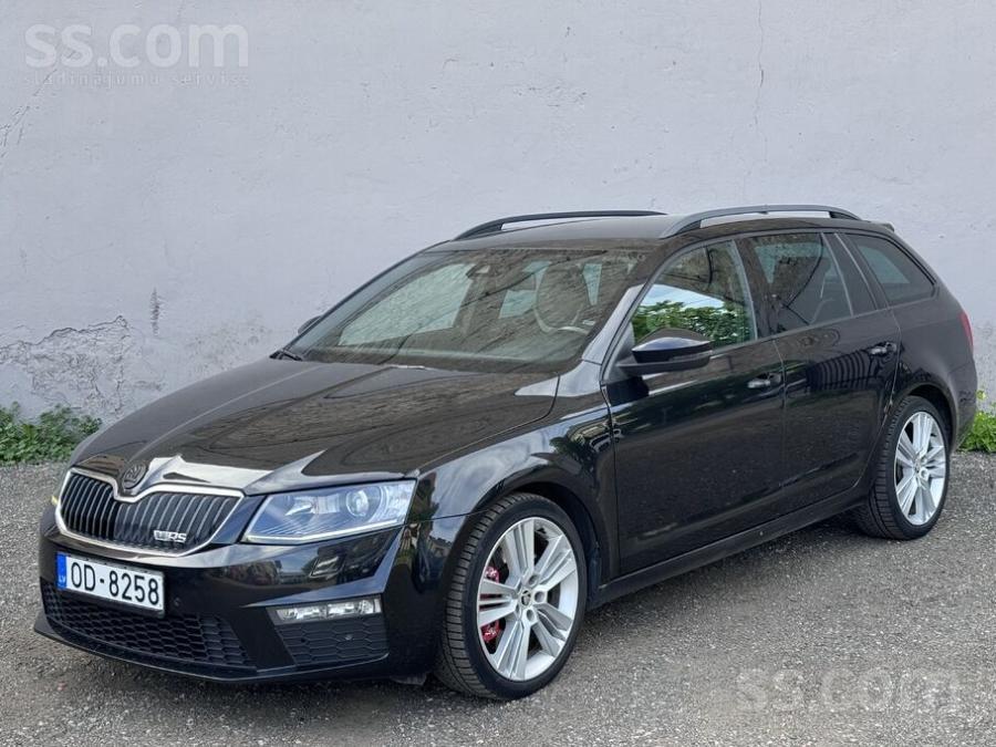 Black Skoda Octavia 2013 in Riga, with an engine capacity of 2.00 L and mileage of 333 thousand km for 6790 €, photo 3 on AUTOMOTO.COM.LV