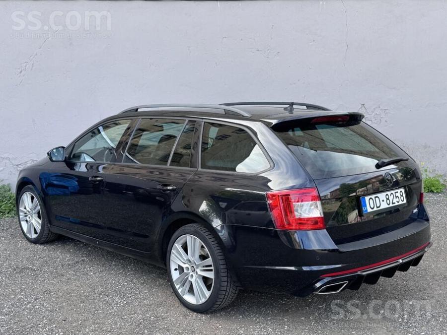 Black Skoda Octavia 2013 in Riga, with an engine capacity of 2.00 L and mileage of 333 thousand km for 6790 €, photo 4 on AUTOMOTO.COM.LV
