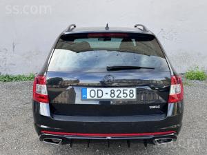 Black Skoda Octavia 2013 in Riga, with an engine capacity of 2.00 L and mileage of 333 thousand km for 6790 €, photo 7 on AUTOMOTO.COM.LV