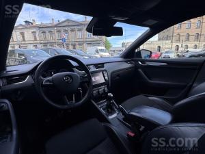 Black Skoda Octavia 2013 in Riga, with an engine capacity of 2.00 L and mileage of 333 thousand km for 6790 €, photo 8 on AUTOMOTO.COM.LV
