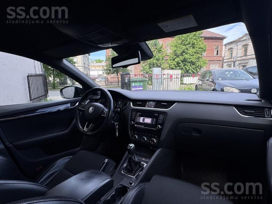 Black Skoda Octavia 2013 in Riga, with an engine capacity of 2.00 L and mileage of 333 thousand km for 6790 €, photo 9 on AUTOMOTO.COM.LV