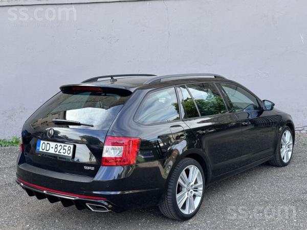 Black Skoda Octavia 2013 in Riga, with an engine capacity of 2.00 L and mileage of 333 thousand km for 6590 €, photo 4 on AUTOMOTO.COM.LV