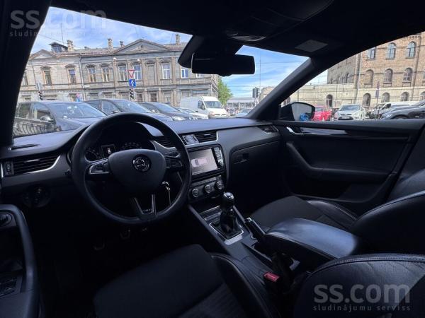 Black Skoda Octavia 2013 in Riga, with an engine capacity of 2.00 L and mileage of 333 thousand km for 6590 €, photo 7 on AUTOMOTO.COM.LV