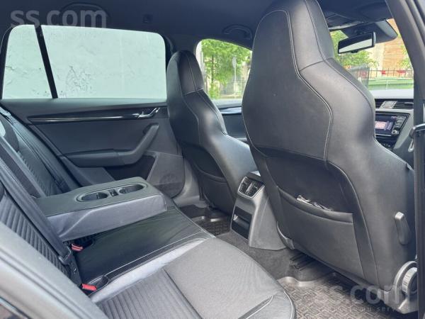 Black Skoda Octavia 2013 in Riga, with an engine capacity of 2.00 L and mileage of 333 thousand km for 6590 €, photo 9 on AUTOMOTO.COM.LV