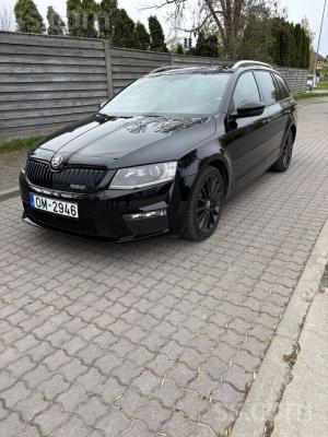 Black Skoda Octavia 2013 in Jelgava, with an engine capacity of 2.00 L and mileage of 215 thousand km for 8000 €, photo 4 on AUTOMOTO.COM.LV
