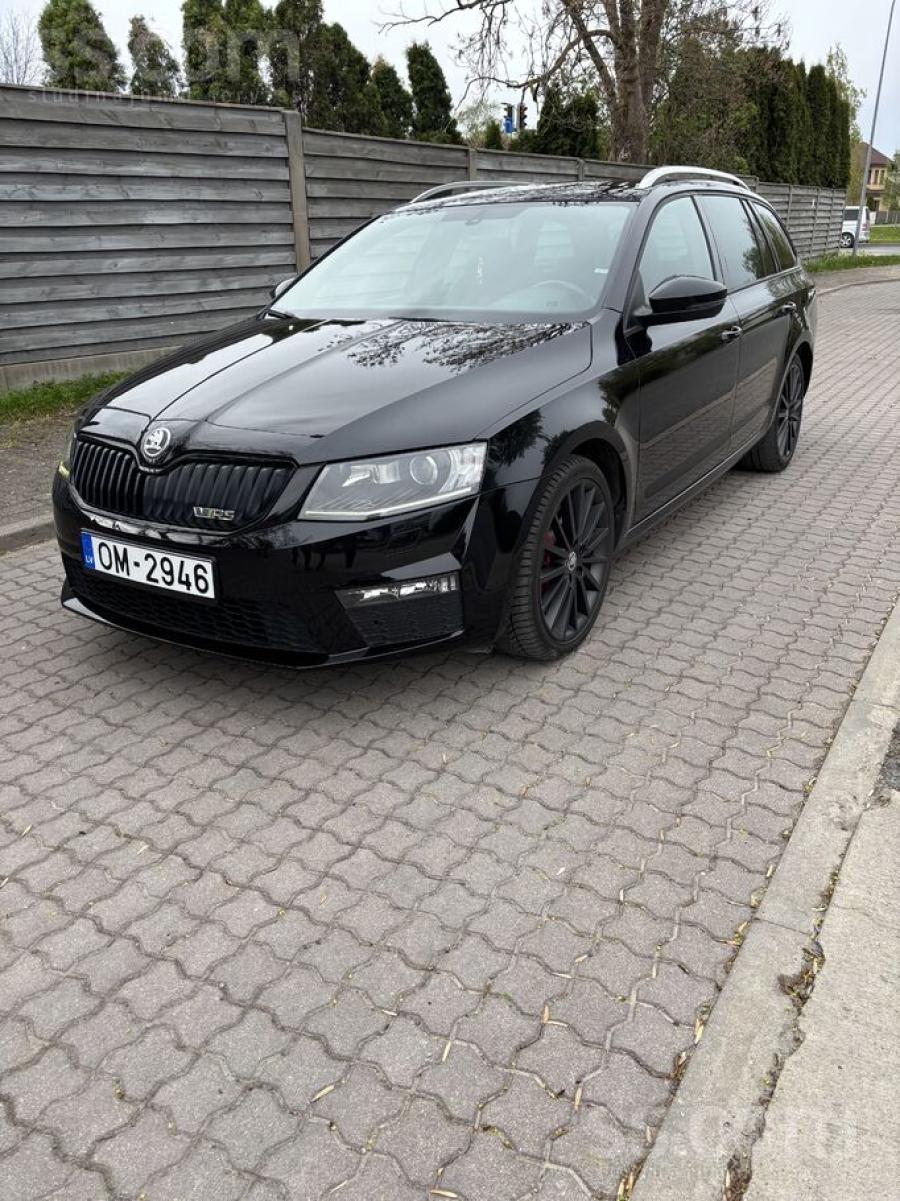 Black Skoda Octavia 2013 in Jelgava, with an engine capacity of 2.00 L and mileage of 215 thousand km for 8000 €, photo 4 on AUTOMOTO.COM.LV