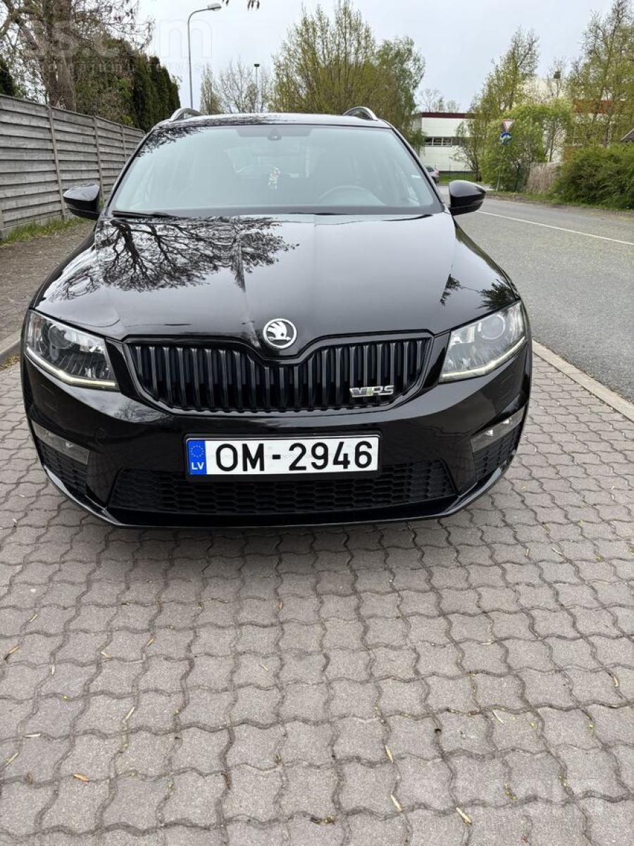 Black Skoda Octavia 2013 in Jelgava, with an engine capacity of 2.00 L and mileage of 215 thousand km for 8000 €, photo 5 on AUTOMOTO.COM.LV