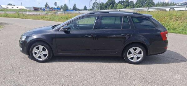 Black Skoda Octavia 2013 in Marijampole, with an engine capacity of 1.60 L and mileage of 257 thousand km for 5300 €, photo 5 on AUTOMOTO.COM.LV