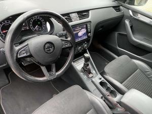 Black Skoda Octavia 2013 in Marijampole, with an engine capacity of 1.97 L and mileage of 245 thousand km for 8350 €, photo 27 on AUTOMOTO.COM.LV