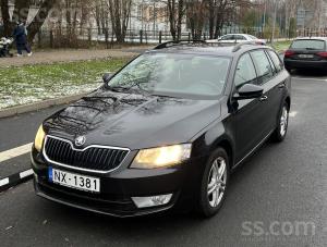 Black Skoda Octavia 2014 in Riga, with an engine capacity of 2.00 L and mileage of 228 thousand km for 8690 €, photo  on AUTOMOTO.COM.LV