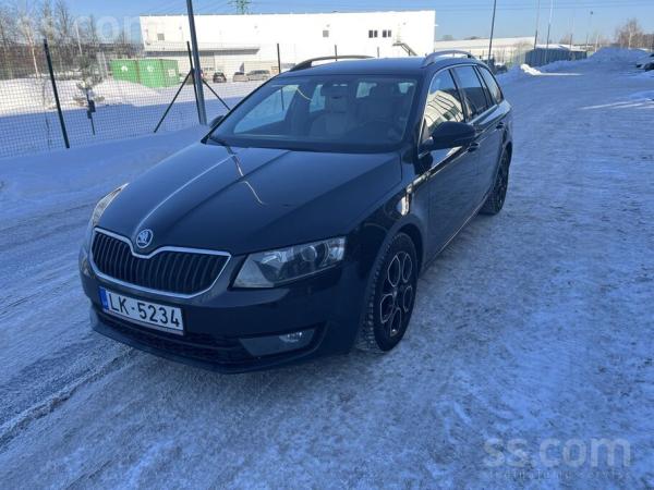 Black Skoda Octavia 2014 in Riga, with an engine capacity of 2.00 L and mileage of 304 thousand km for 7300 €, photo 1 on AUTOMOTO.COM.LV