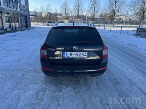 Black Skoda Octavia 2014 in Riga, with an engine capacity of 2.00 L and mileage of 304 thousand km for 7300 €, photo 5 on AUTOMOTO.COM.LV