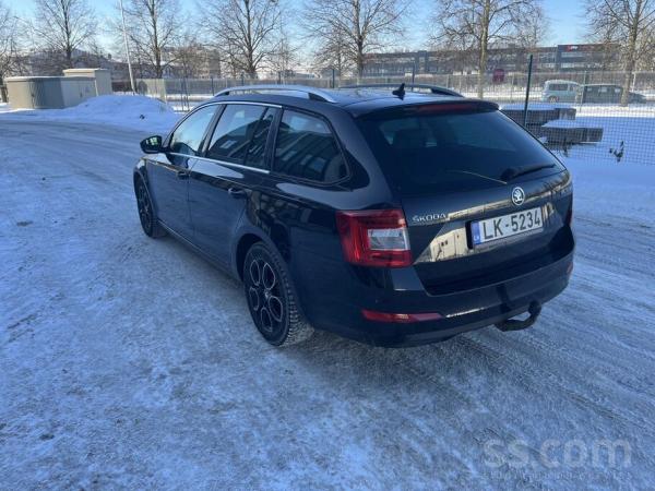 Black Skoda Octavia 2014 in Riga, with an engine capacity of 2.00 L and mileage of 304 thousand km for 7300 €, photo 6 on AUTOMOTO.COM.LV