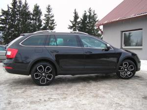 Black Skoda Octavia 2014 in Riga, with an engine capacity of 2.00 L and mileage of 0 thousand km for 10990 €, photo 3 on AUTOMOTO.COM.LV