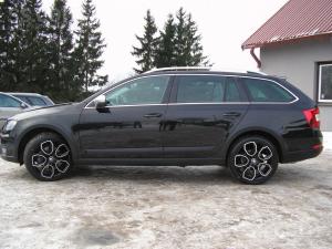 Black Skoda Octavia 2014 in Riga, with an engine capacity of 2.00 L and mileage of 0 thousand km for 10990 €, photo 8 on AUTOMOTO.COM.LV