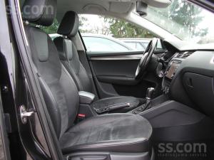 Black Skoda Octavia 2014 in Riga, with an engine capacity of 2.00 L and mileage of 0 thousand km for 10990 €, photo 25 on AUTOMOTO.COM.LV