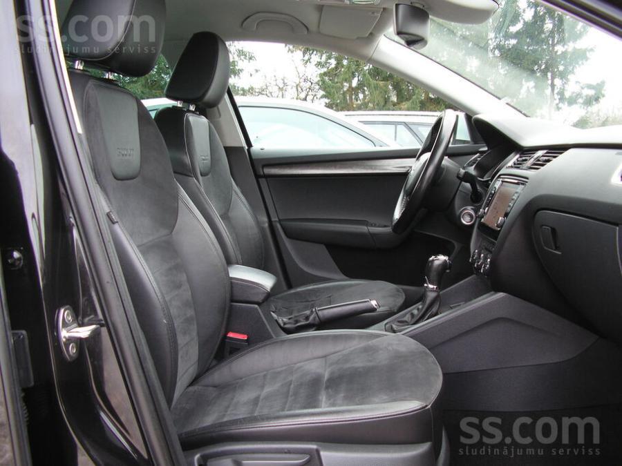 Black Skoda Octavia 2014 in Riga, with an engine capacity of 2.00 L and mileage of 0 thousand km for 10990 €, photo 25 on AUTOMOTO.COM.LV