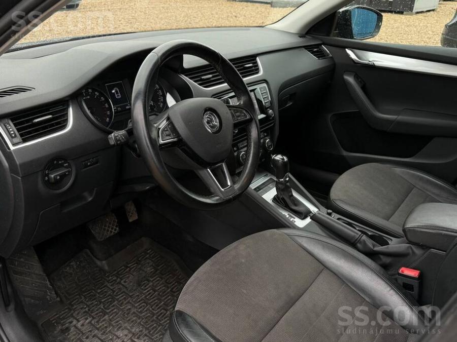 Black Skoda Octavia 2014 in Riga, with an engine capacity of 2.00 L and mileage of 347 thousand km for 4990 €, photo 4 on AUTOMOTO.COM.LV