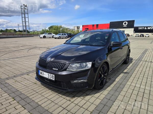 Black Skoda Octavia 2014 in Riga, with an engine capacity of 2.00 L and mileage of 266 thousand km for 10500 €, photo 1 on AUTOMOTO.COM.LV