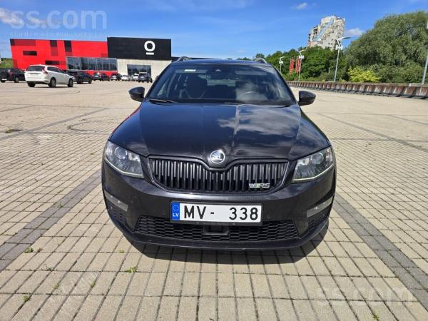 Black Skoda Octavia 2014 in Riga, with an engine capacity of 2.00 L and mileage of 266 thousand km for 10500 €, photo 2 on AUTOMOTO.COM.LV