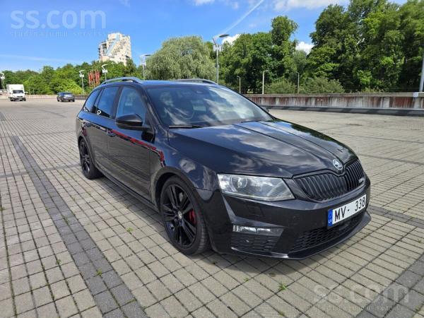 Black Skoda Octavia 2014 in Riga, with an engine capacity of 2.00 L and mileage of 266 thousand km for 10500 €, photo 3 on AUTOMOTO.COM.LV