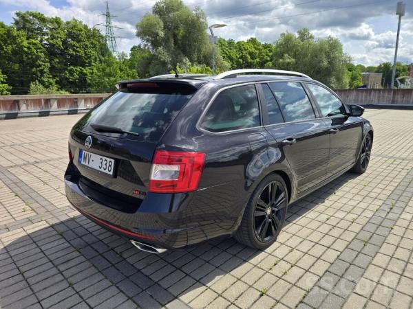 Black Skoda Octavia 2014 in Riga, with an engine capacity of 2.00 L and mileage of 266 thousand km for 10500 €, photo 5 on AUTOMOTO.COM.LV