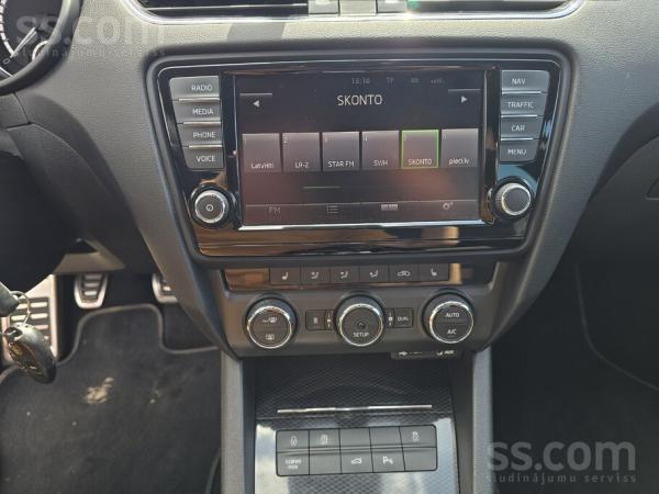 Black Skoda Octavia 2014 in Riga, with an engine capacity of 2.00 L and mileage of 266 thousand km for 10500 €, photo 8 on AUTOMOTO.COM.LV