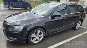 Black Skoda Octavia 2014 in Riga, with an engine capacity of 2.00 L and mileage of 312 thousand km for 6700 €, photo  on AUTOMOTO.COM.LV